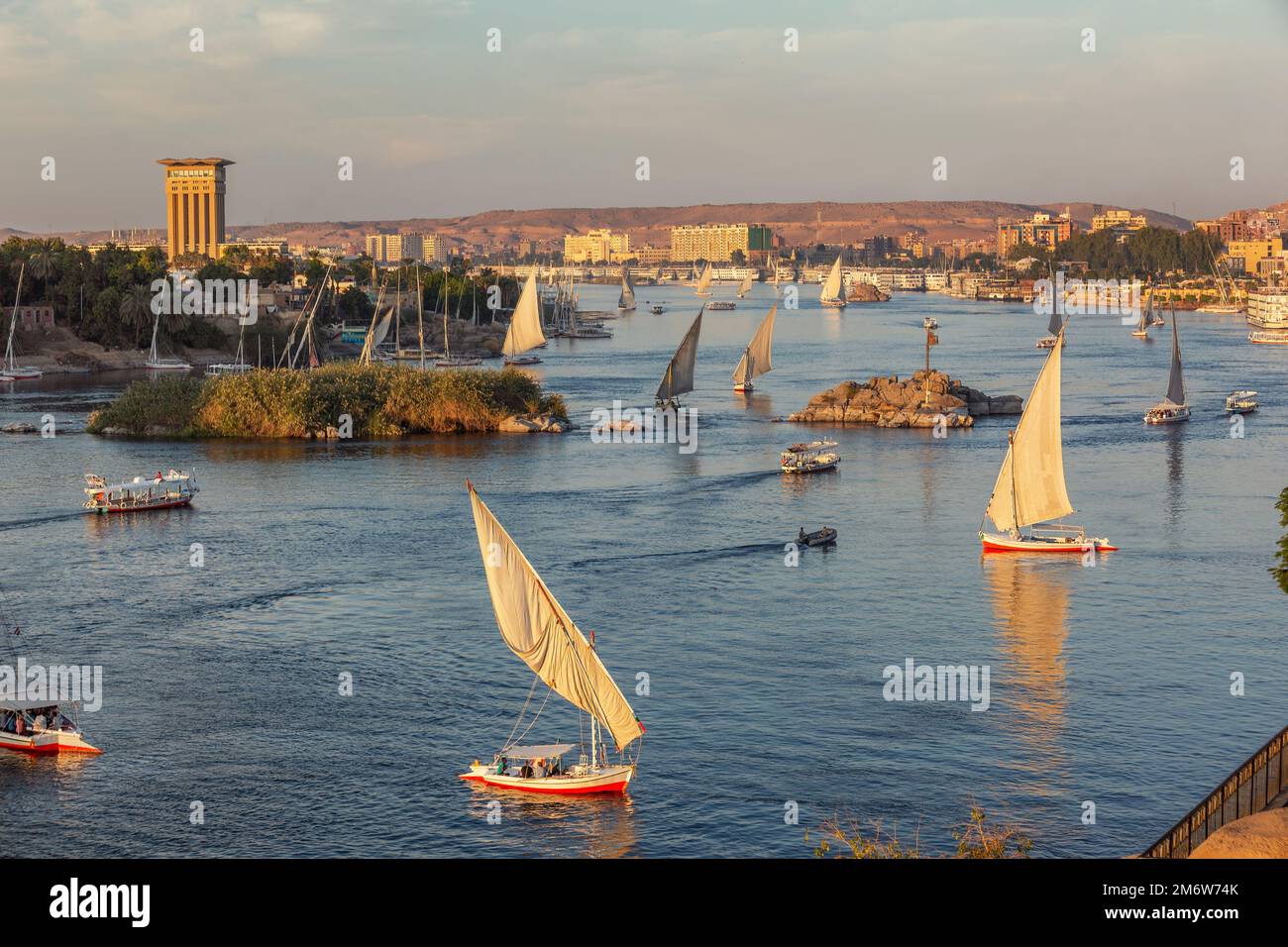 Felucca boats on Nile river in Aswan Stock Photo - Alamy