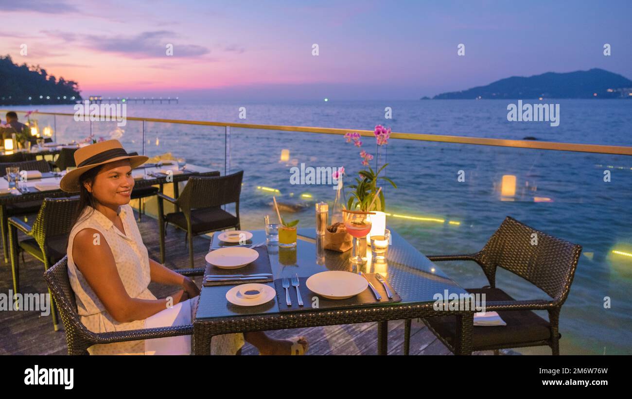 Romantic dinner on the beach with Thai food during sunset on the Island Phuket Thailand Stock ...