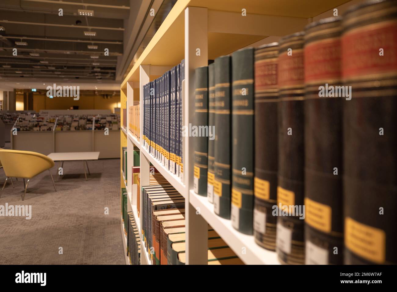 Selective focus and Interior view of corridor between row of bookshelf ...