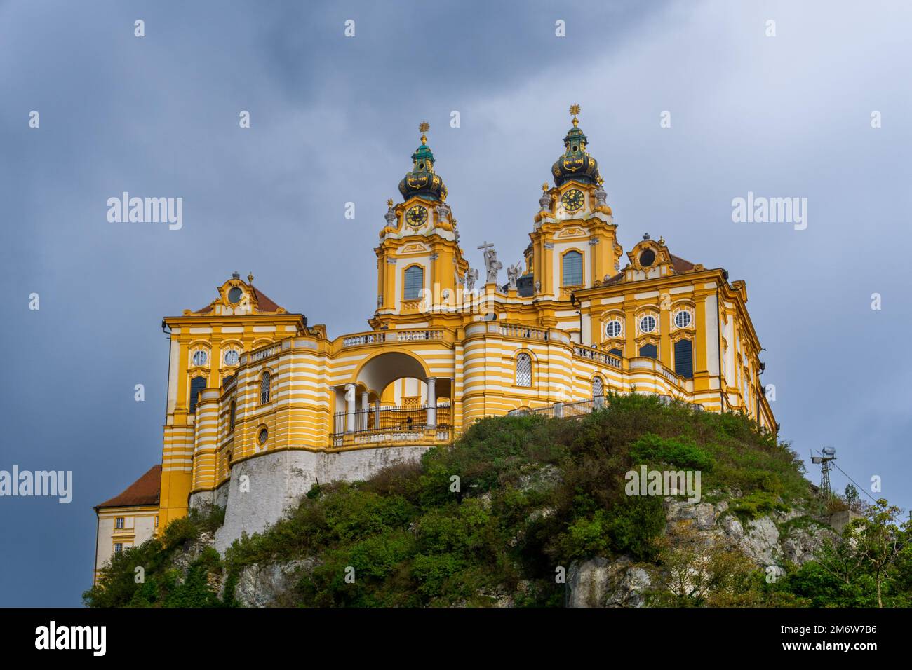 The historic Melk Abbey and church spires on the rocky promontory above ...