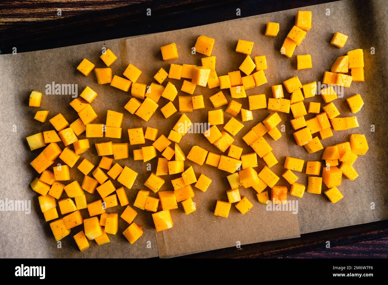 Diced Butternut Squash Tossed in Olive Oil on a Sheet Pan: Cubes of ...
