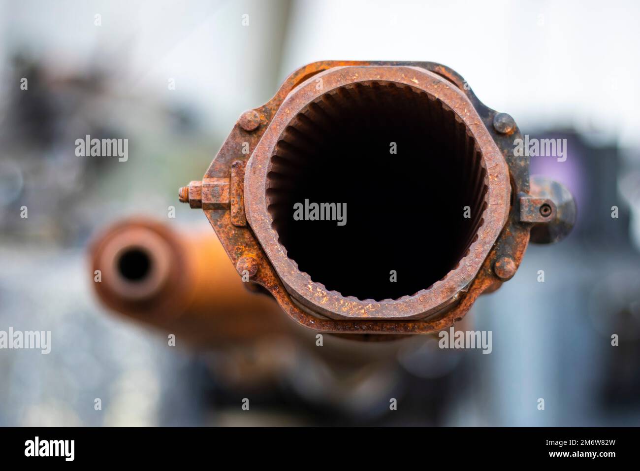Tank gun, barrel muzzle of a military army close-up. Broken burnt tank ...