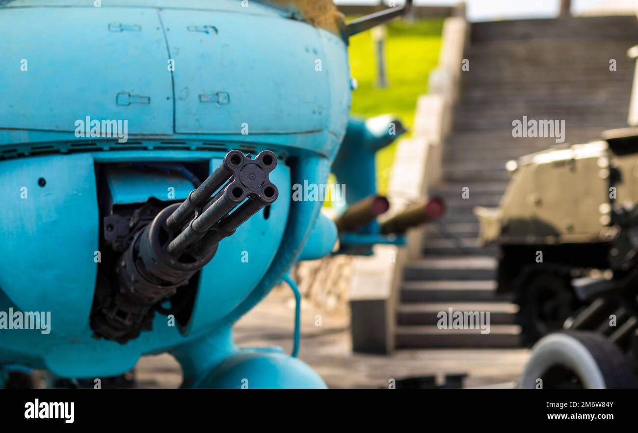 Selective focus of machine gun on combat helicopter. Attack helicopter ...