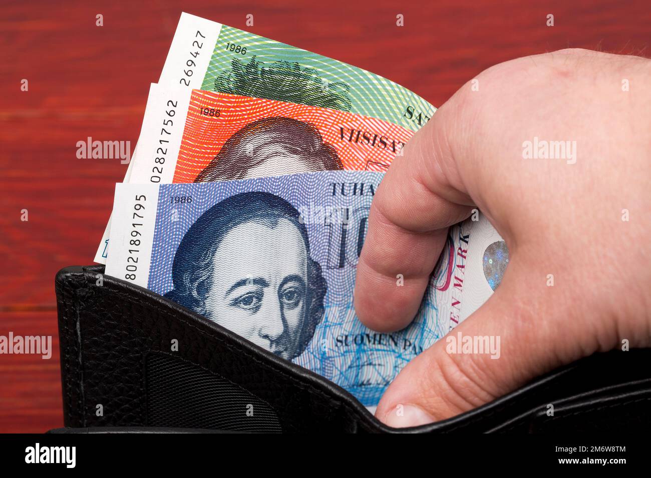 Finnish markka in the black wallet Stock Photo - Alamy