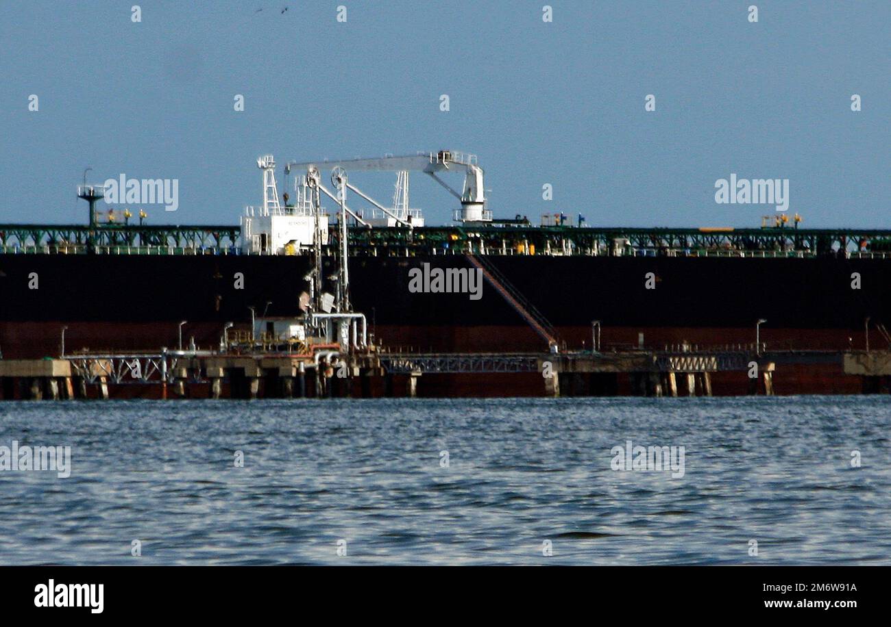 Two oil tankers, the Kerala and Fiorella, load crude oil at the Bajo ...