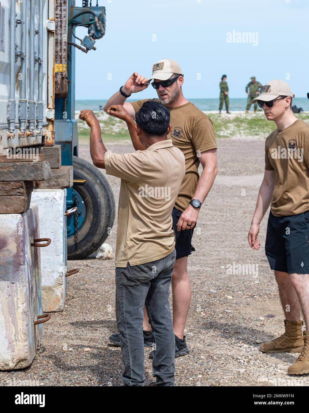 Chief Petty Offier Evan Beaton (left) and Master Sailor Kieran Scott ...