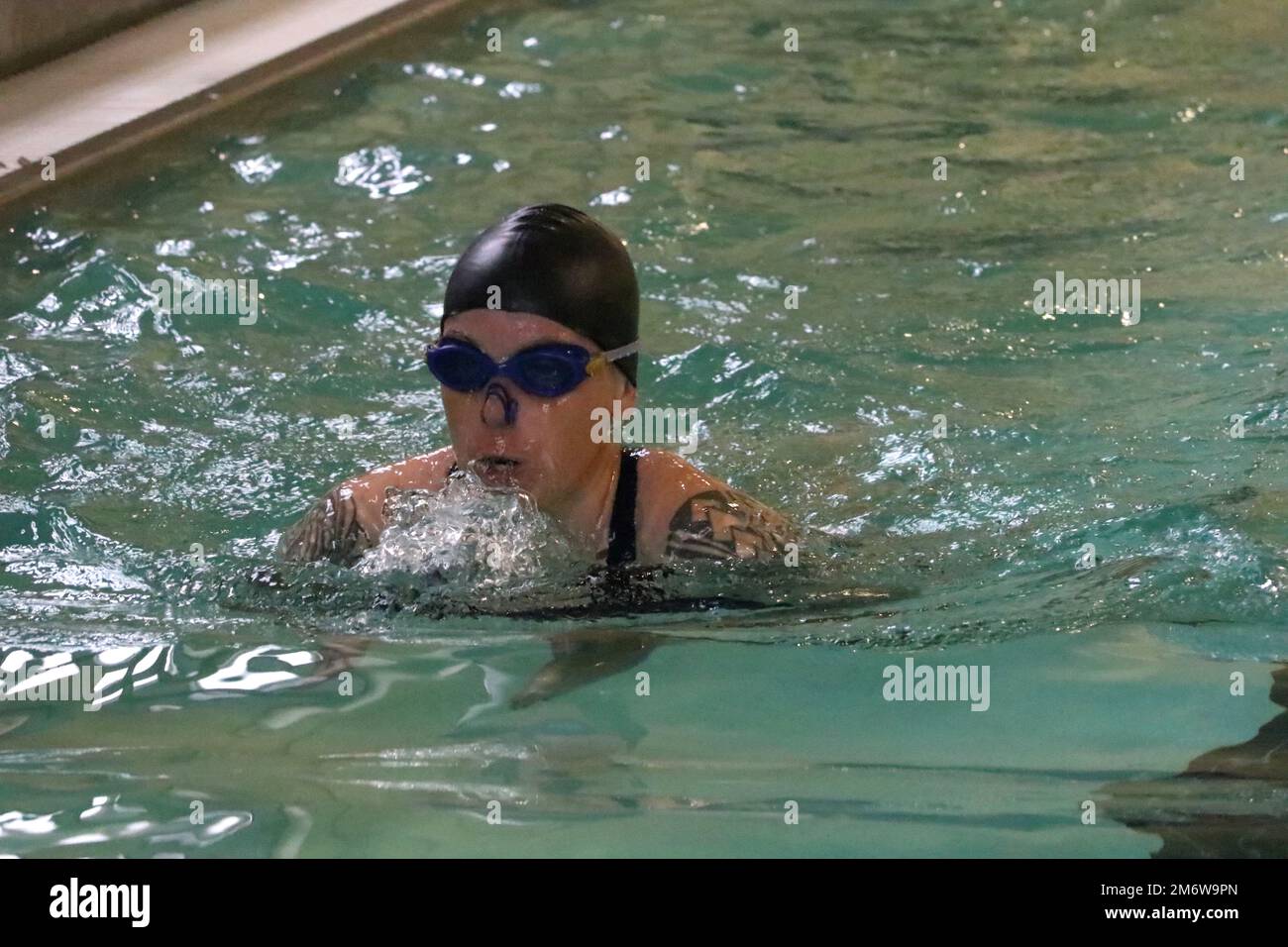 U.S. Army Staff Sgt. Stacey Englert uses great form on her way to the ...