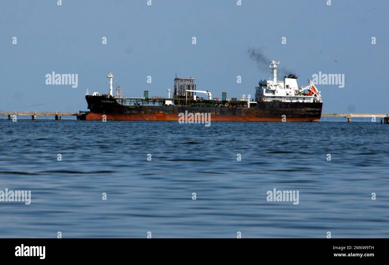 Two oil tankers, the Kerala and Fiorella, load crude oil at the Bajo ...