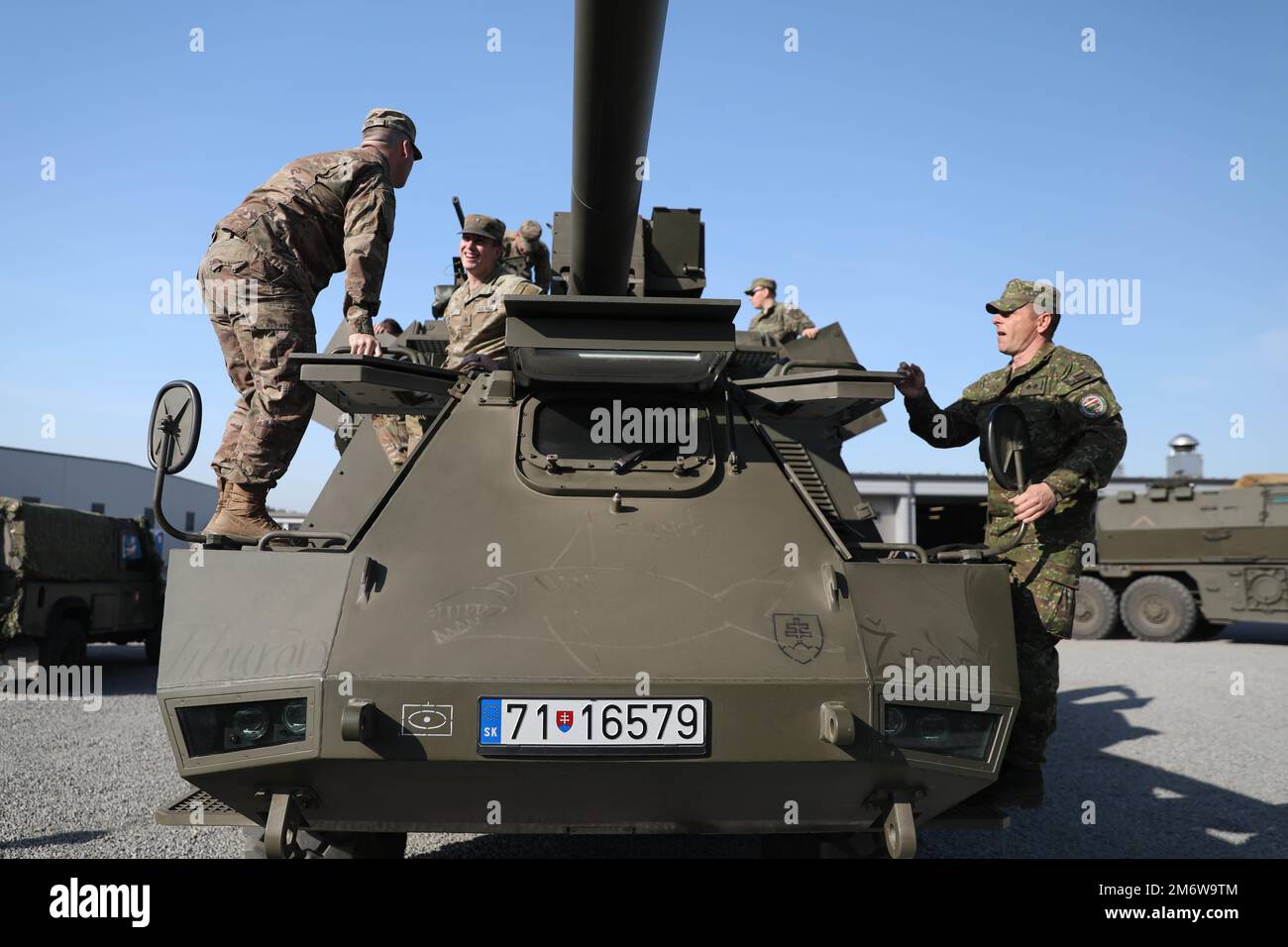 Soldiers assigned to 1st Infantry Division Artillery, and Slovakian ...