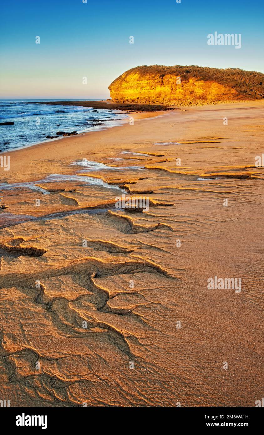 The limestone cliffs and beach of Bells Beach, Great Ocean Road ...