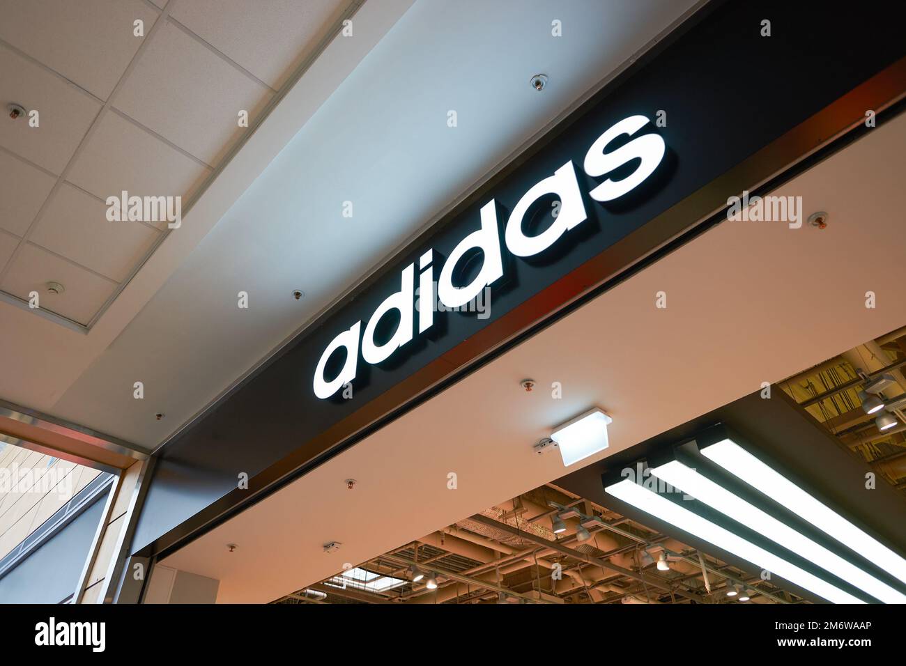 SAINT PETERSBURG, RUSSIA - CIRCA APRIL, 2017: Adidas sign over store ...