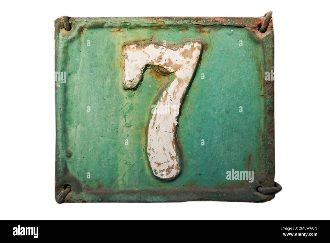 Old retro weathered cast iron plate with number 7 closeup isolated on ...