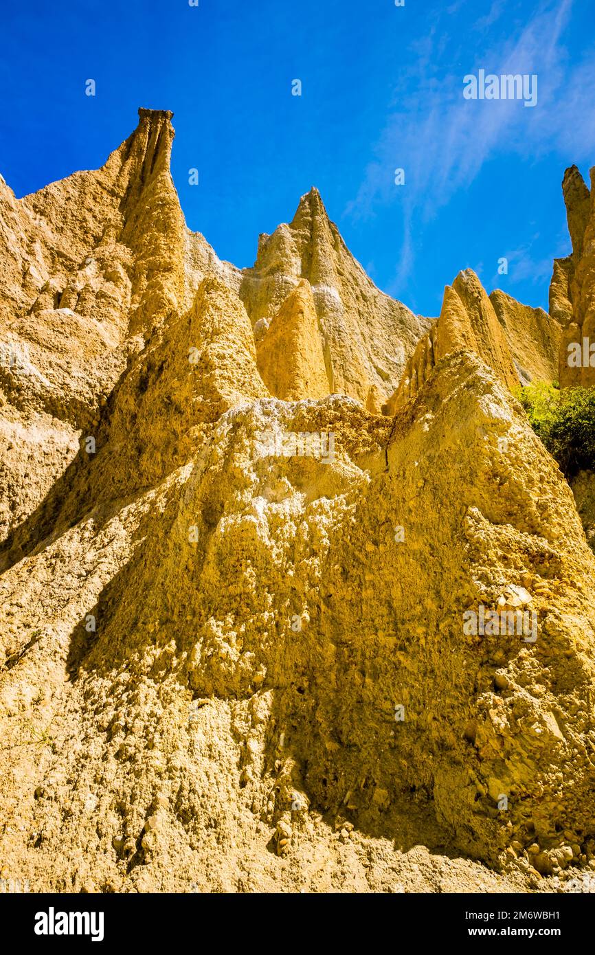 Clay Cliffs against Blue Sky in New Zealand Stock Photo - Alamy
