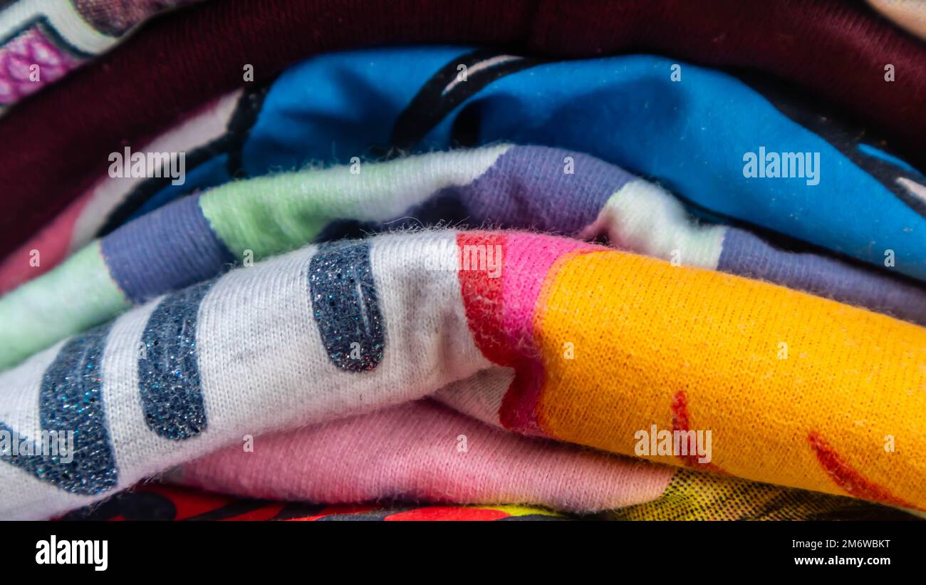 pile of clothes as background Stock Photo - Alamy