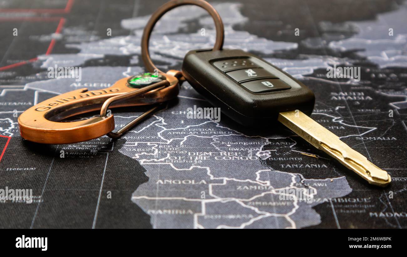black car key over black map Stock Photo - Alamy