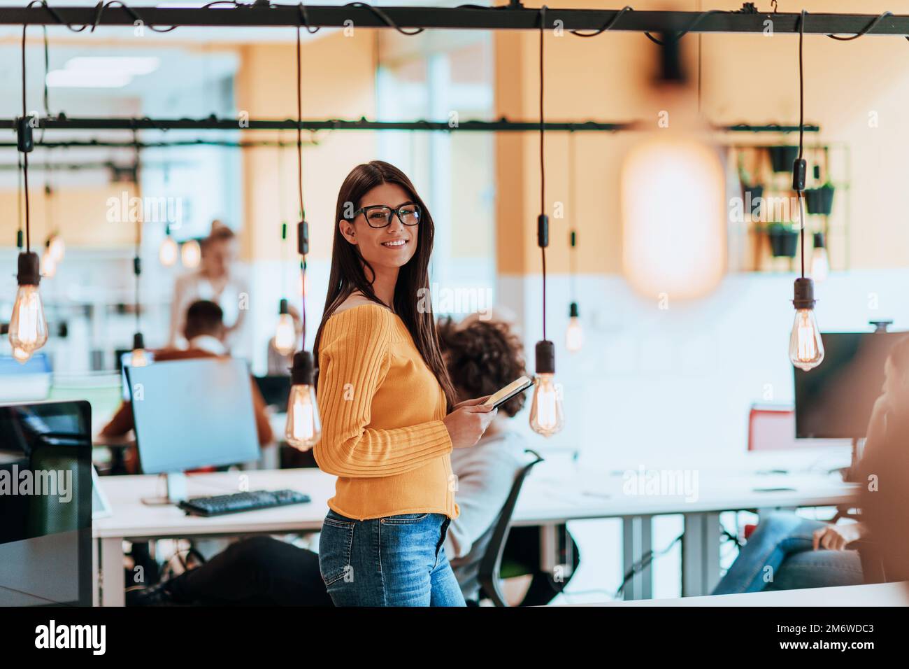 Female boss, manager executive posing in a modern startup office while ...