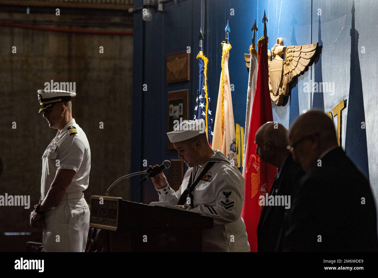 U.S. Navy Religious Program Specialist, 2nd Class Adam Davies provides ...