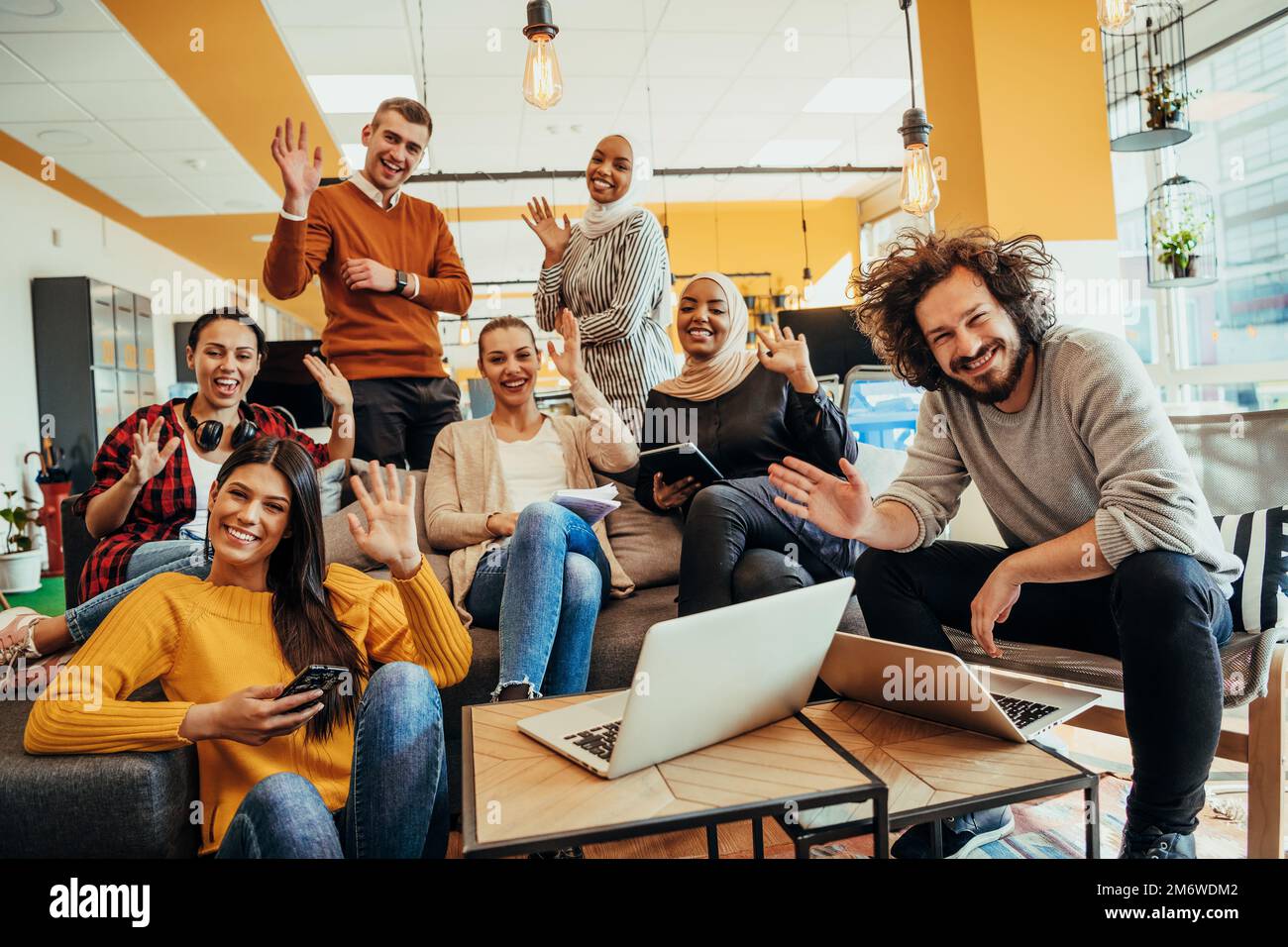 Group of multi-ethnic colleagues working on desktop computers, laptop ...