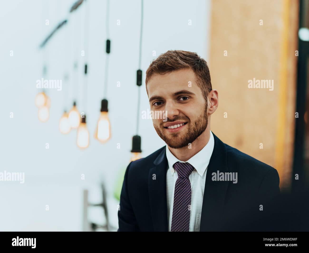 Portrait of a successful boss in a modern office Stock Photo - Alamy