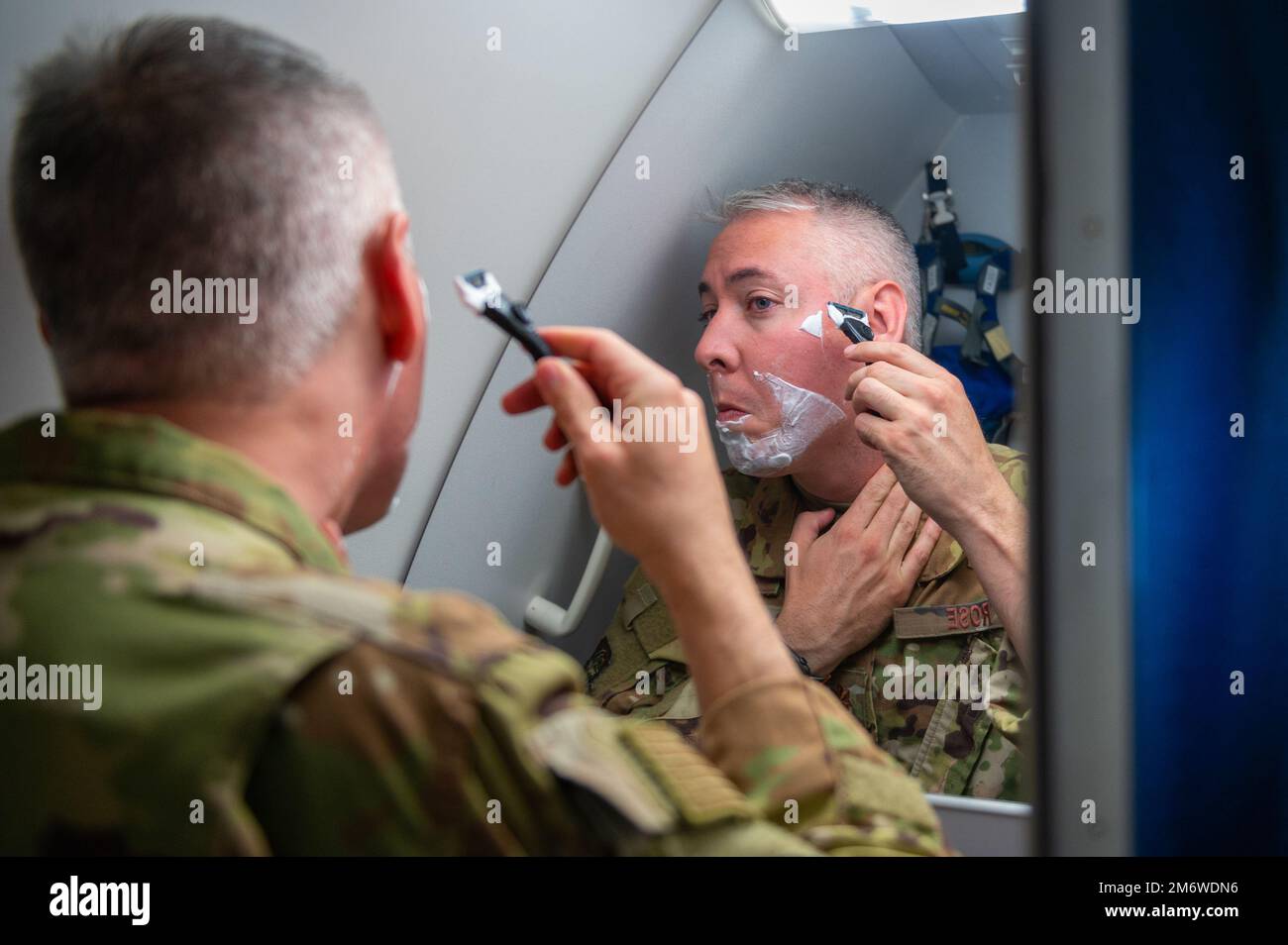 Major Kevin Rose, 349th Air Refueling Squadron instructor pilot, shaves ...