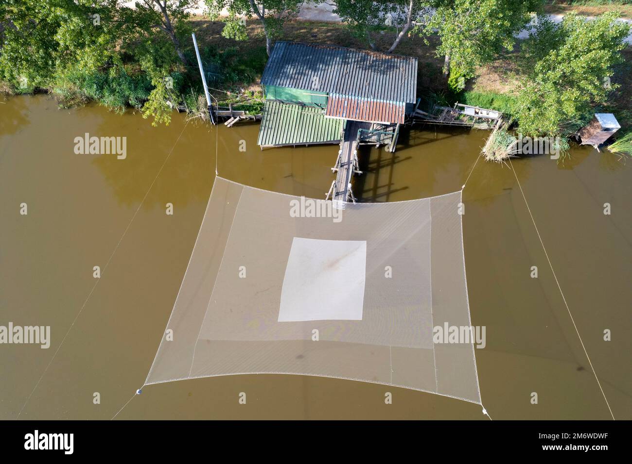 Aerial photograph of old fishing post with net Stock Photo - Alamy
