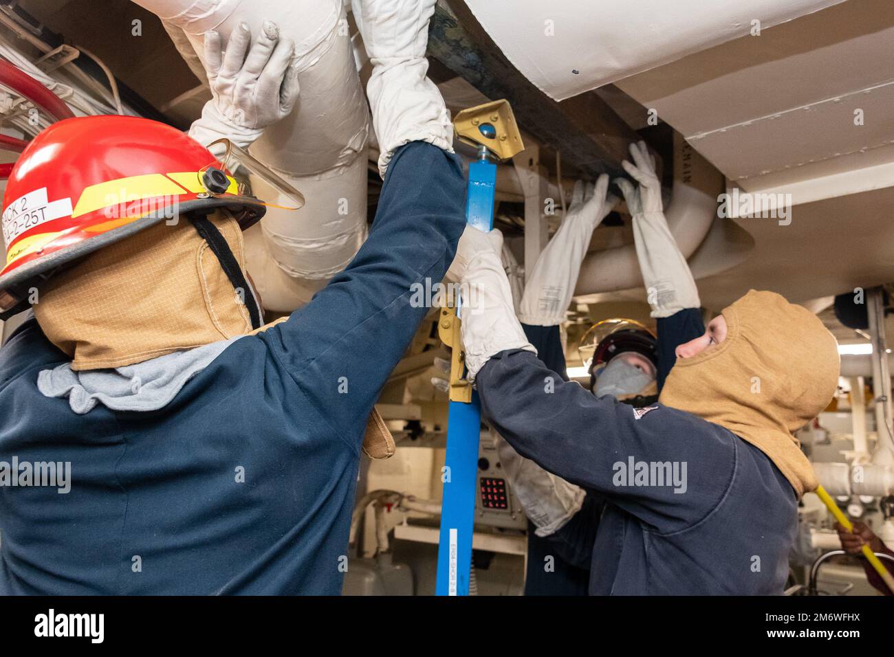 220506-N-VQ947-1113 SAN DIEGO (May 6, 2022) — Sailors use metal shoring ...
