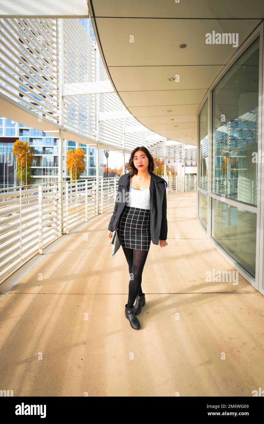 Beautiful Young Woman Standing in an Outdoor Walkway Facing the Camera ...