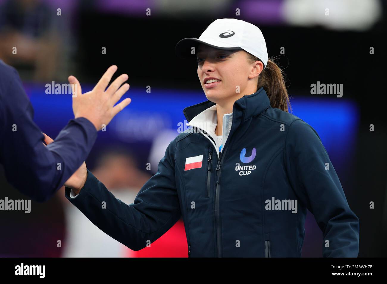 Sydney, Australia. 06th Jan, 2023. Iga Swiatek of Poland shakes hands ...