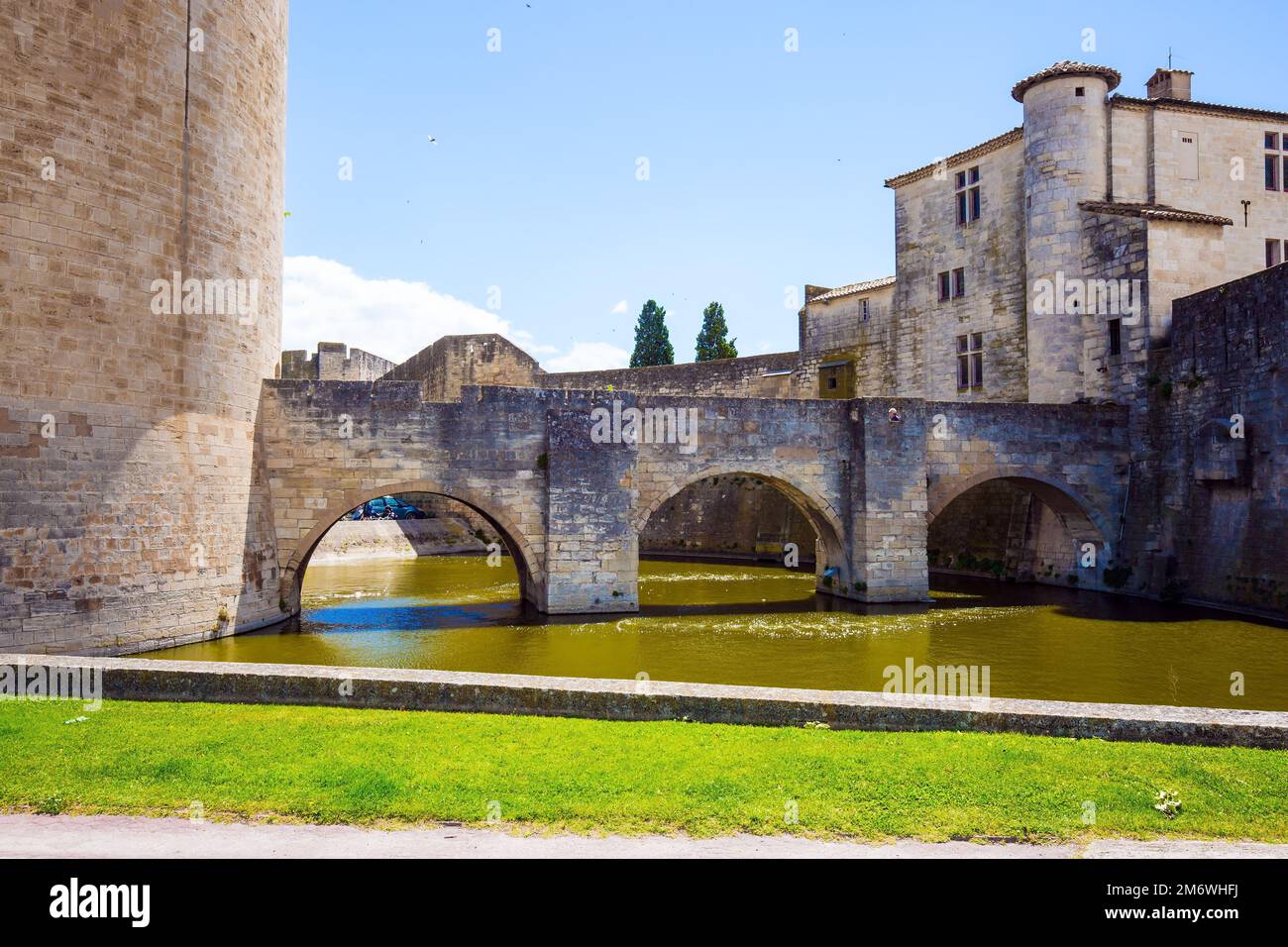 Powerful walls and a moat with water Stock Photo - Alamy