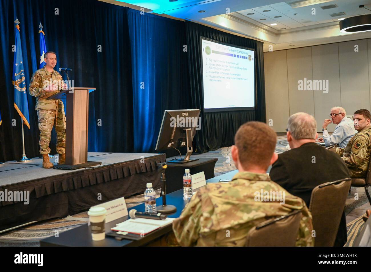 U.S. Air Force Capt. Thomas Buckner, left, civil engineer officer ...