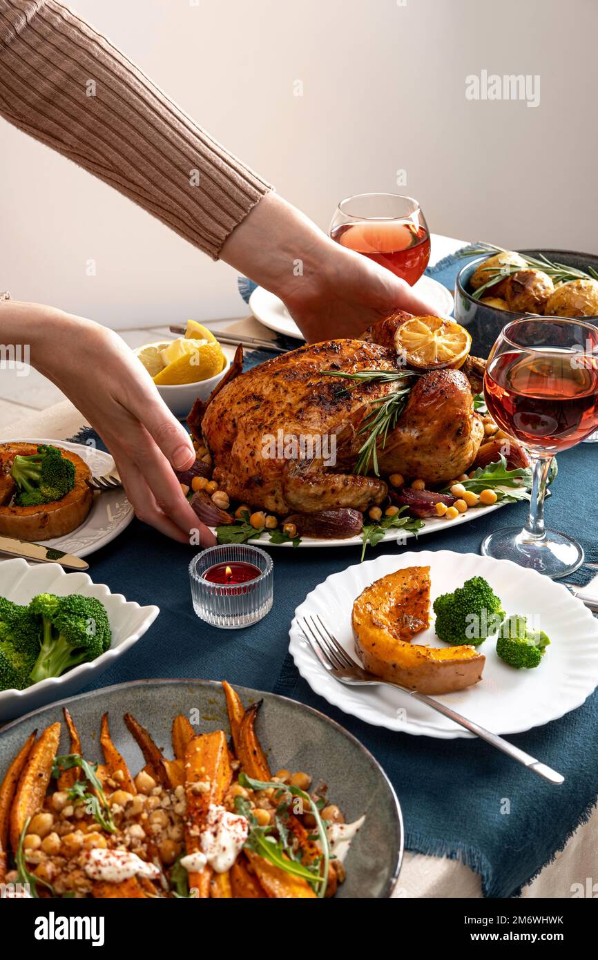 People celebrating Thanksgiving Day. Thanksgiving party table setting ...