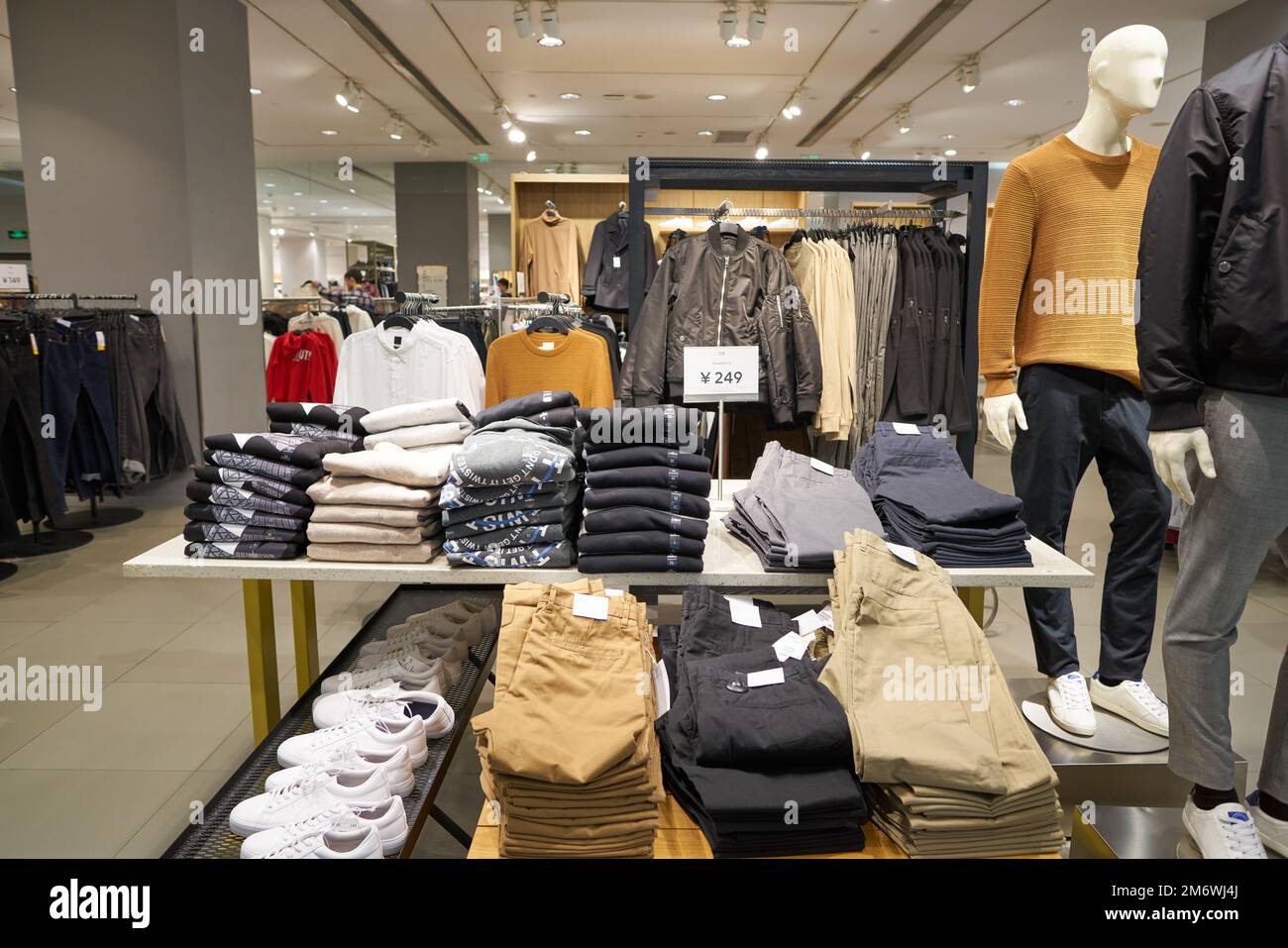 SHENZHEN, CHINA - CIRCA NOVEMBER, 2019: apparel on display at H and M ...