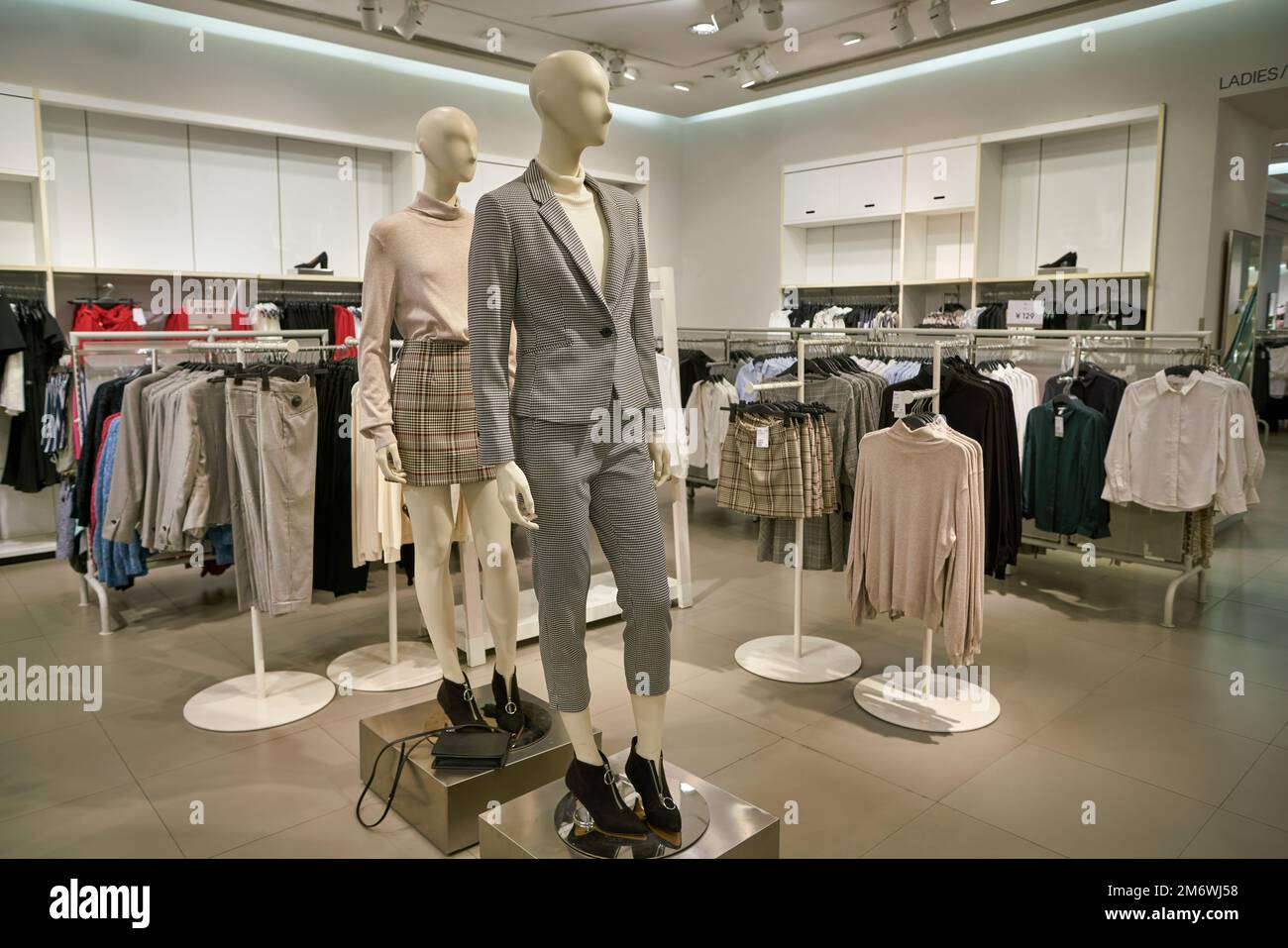 SHENZHEN, CHINA - CIRCA NOVEMBER, 2019: apparel on display at H and M ...