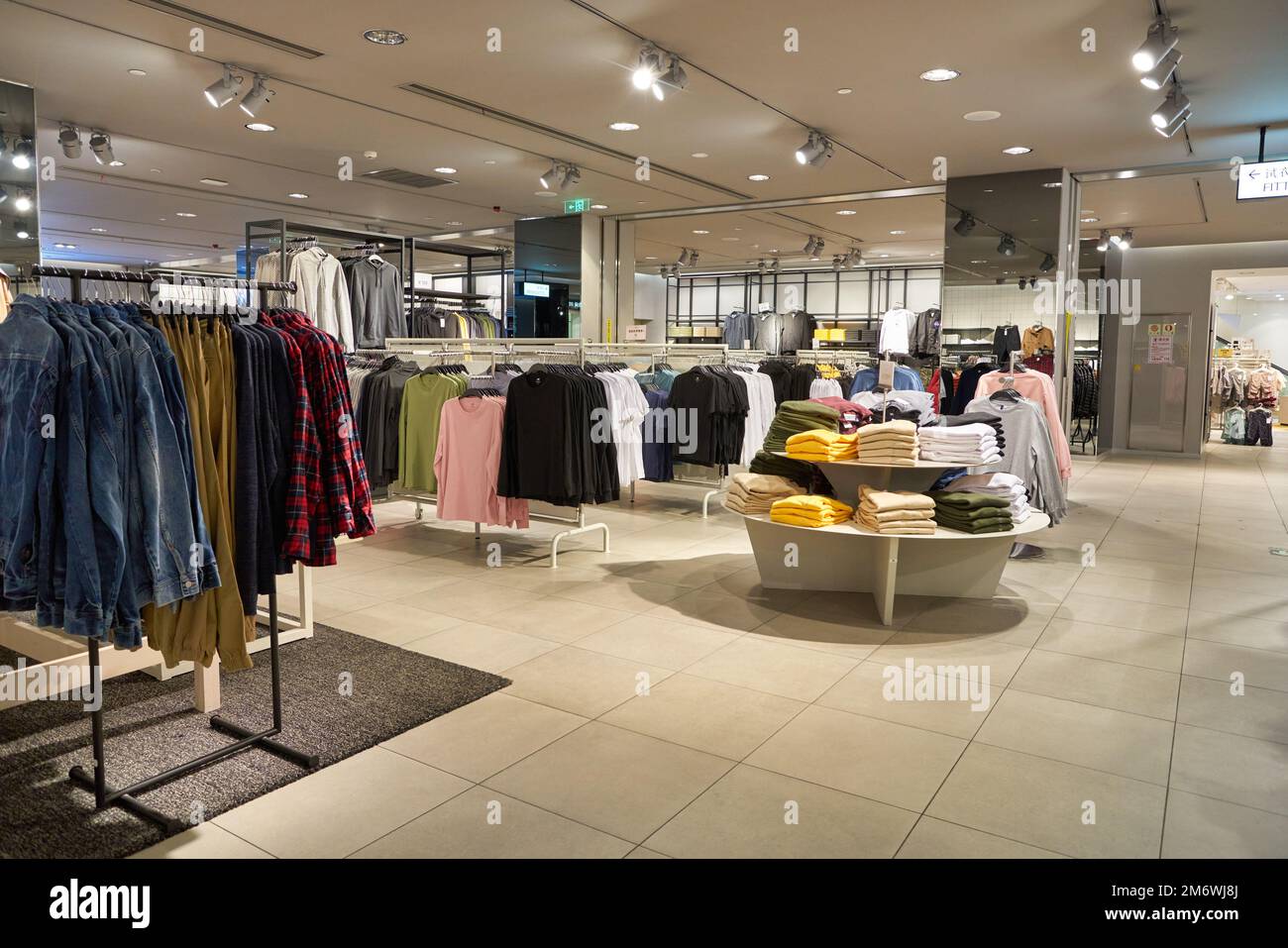 SHENZHEN, CHINA - CIRCA NOVEMBER, 2019: apparel on display at H and M ...
