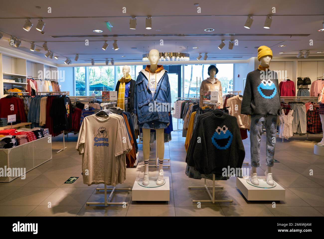 SHENZHEN, CHINA - CIRCA NOVEMBER, 2019: apparel on display at H and M ...