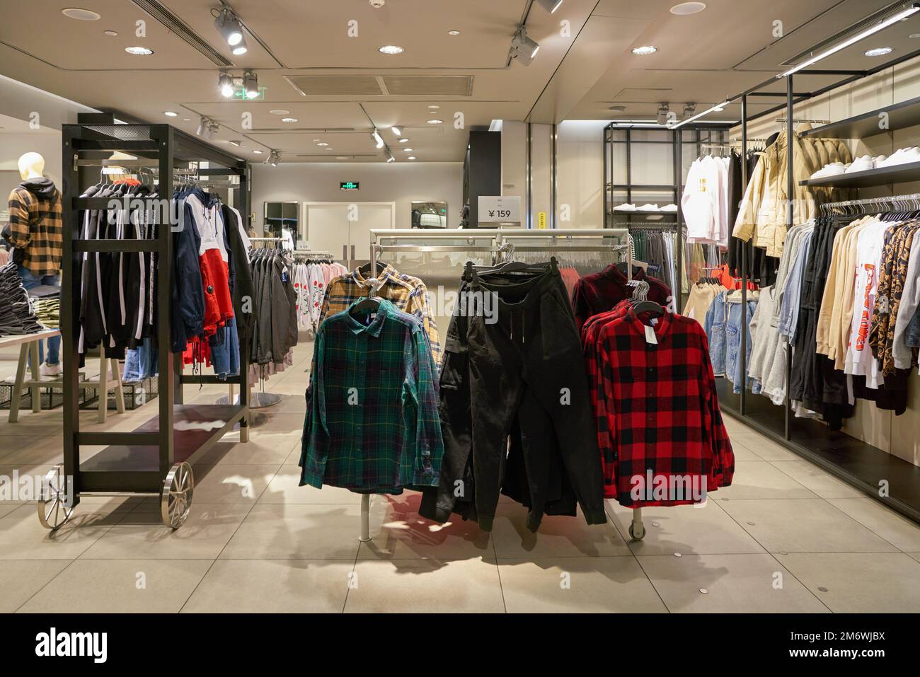 SHENZHEN, CHINA - CIRCA NOVEMBER, 2019: apparel on display at H and M ...