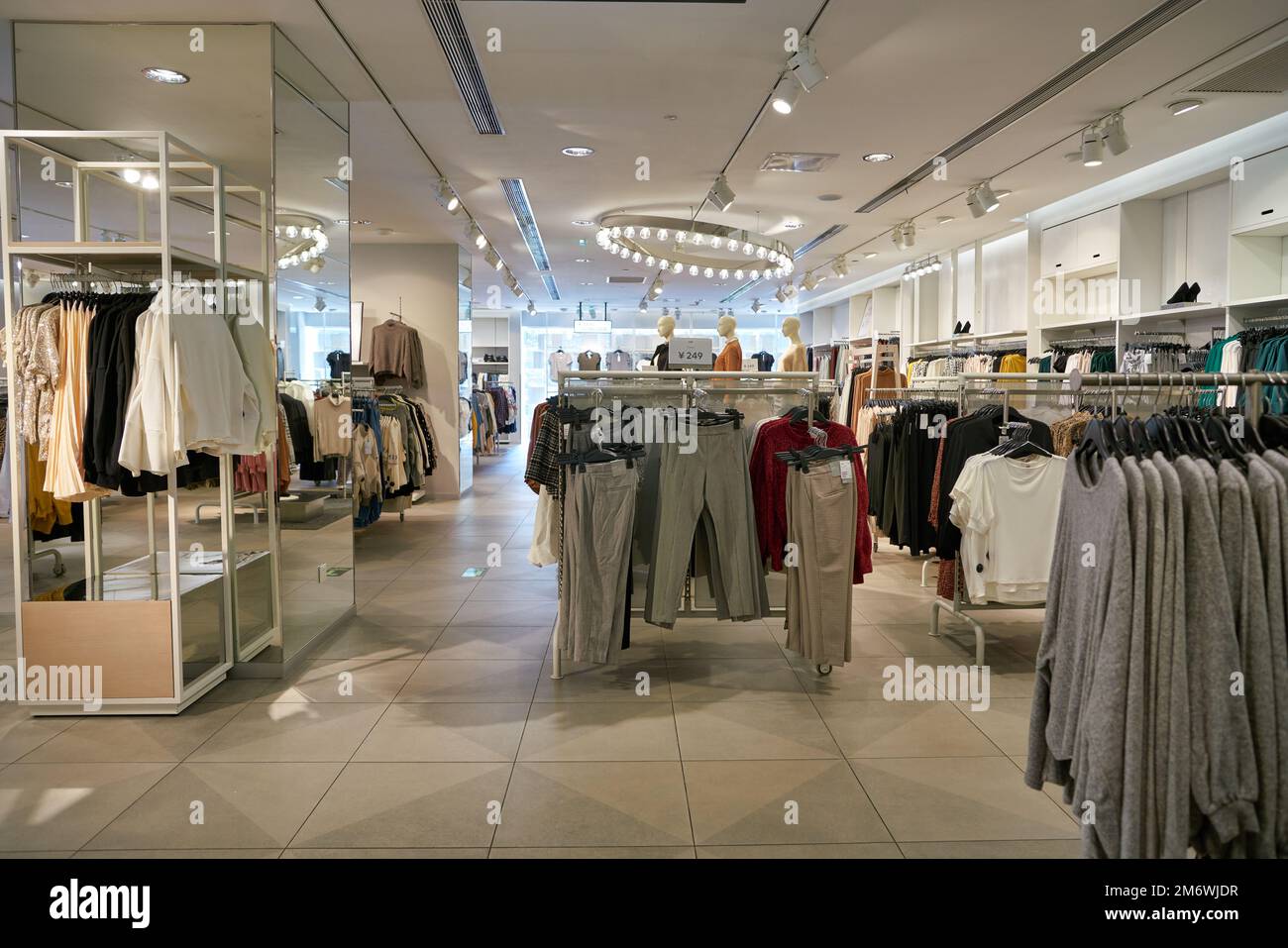 SHENZHEN, CHINA - CIRCA NOVEMBER, 2019: apparel on display at H and M ...