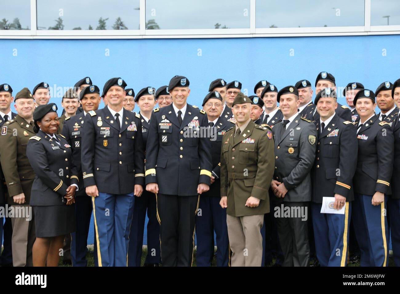 Maj. Gen. Jeff Broadwater poses with students following a commencement ...