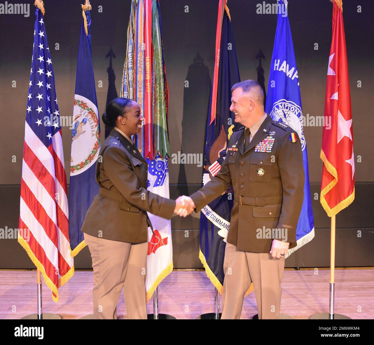 Newly promoted 2nd Lt. shaking hands with Gen. Paul E. Funk II, TRADOC ... Newly promoted 2nd Lt. shaking hands with Gen. Paul E. Funk II, TRADOC ...