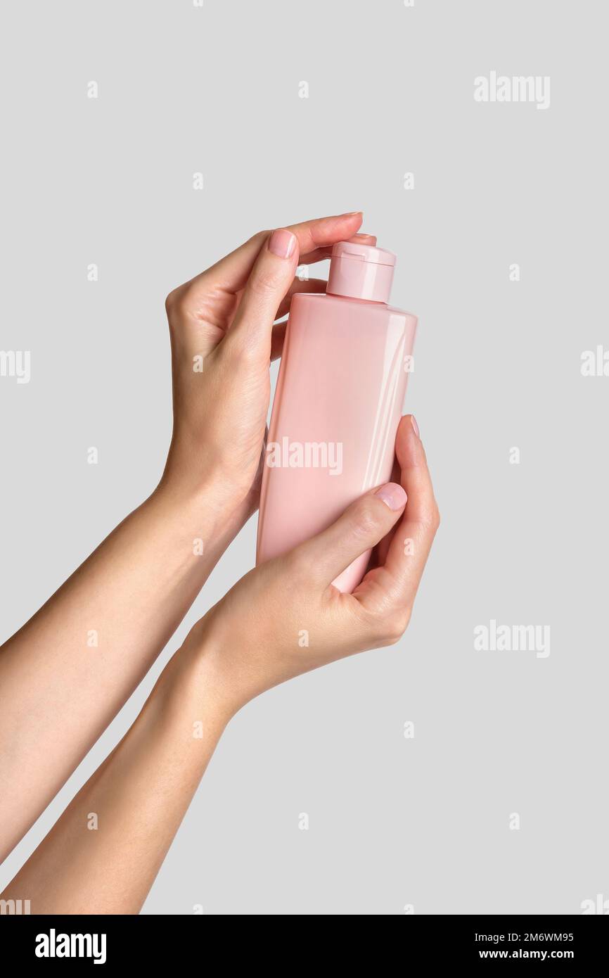 Woman hand showing cream product. Cosmetic product branding mockup ...