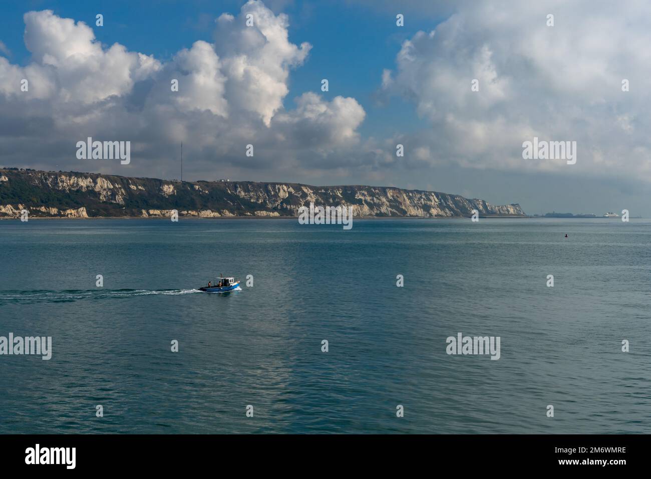 Small fishing boat heading into the English Channel with the White ...