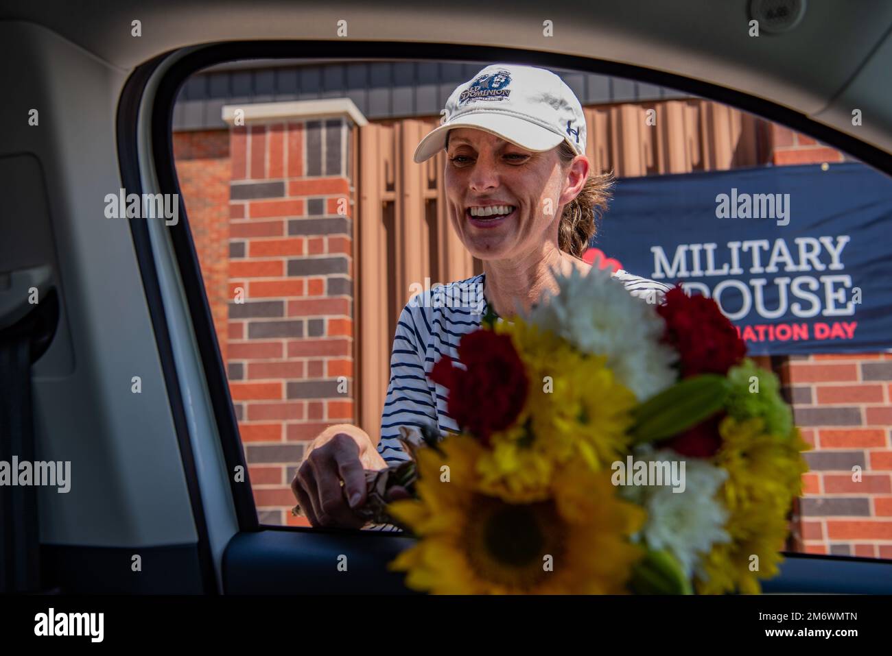 Kelsey Kramer, a volunteer at the military spouse appreciation drive ...