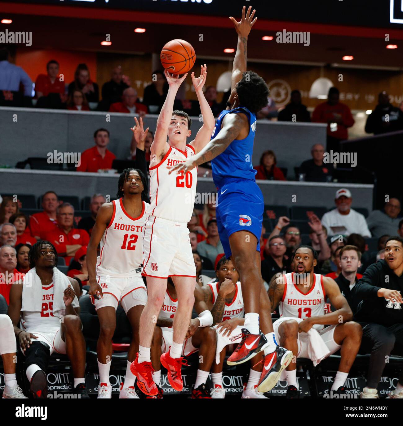 Houston, TX, USA. 5th Jan, 2023. Houston guard Ryan Elvin (20) shoots a ...