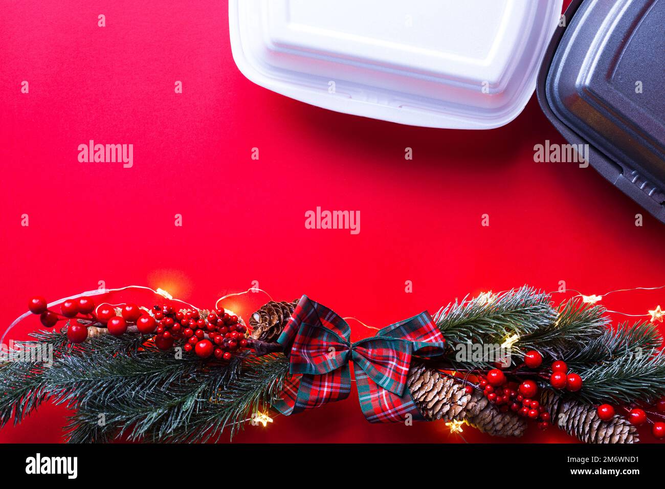 Christmas decor of food delivery service containers. New year's eve ...