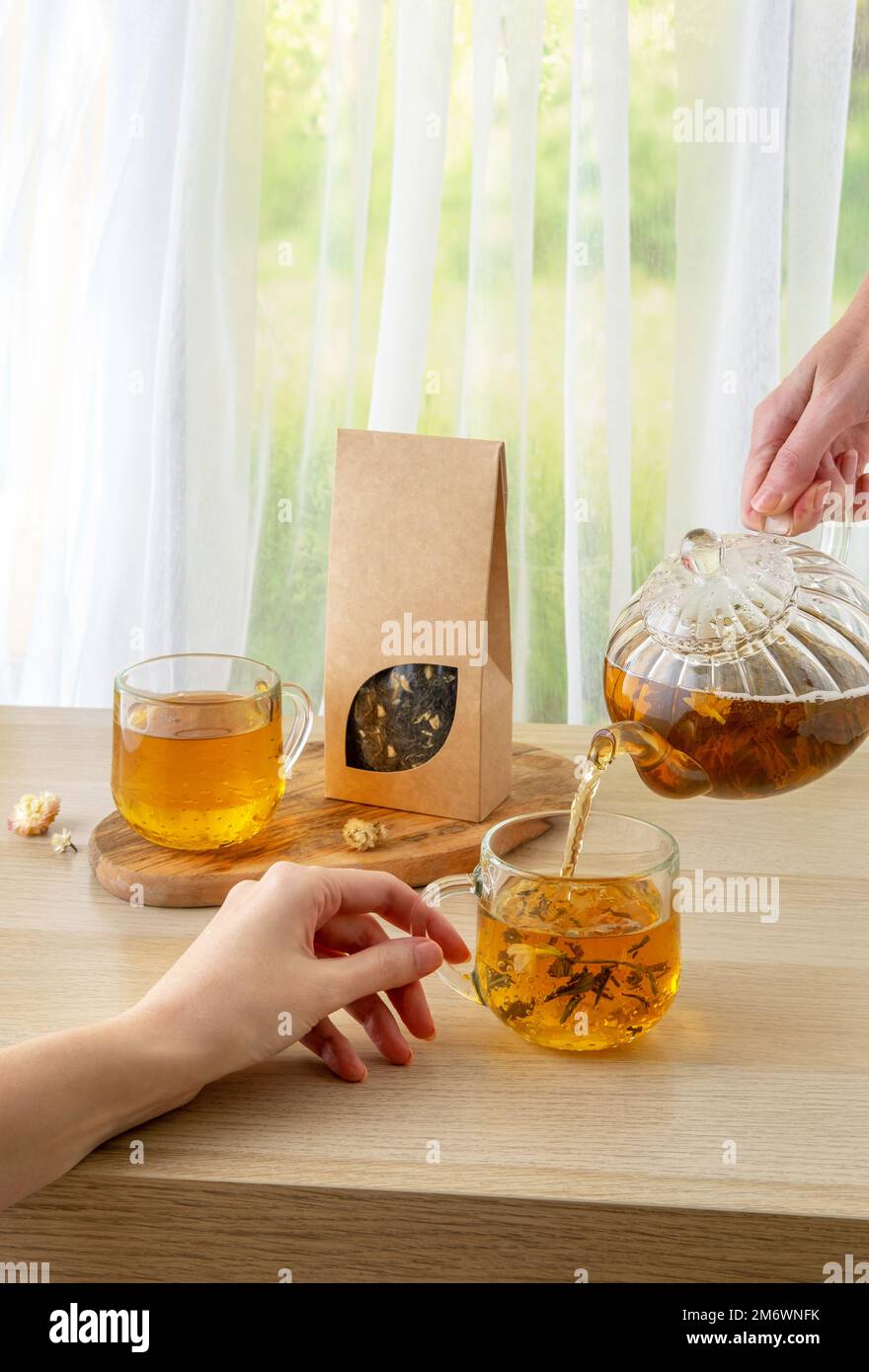 Organic tea branding and packaging mockup. Jasmine green tea in glass ...