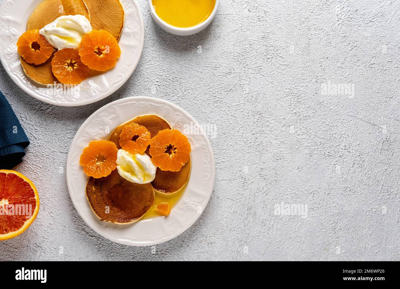 Delicious pancakes with tangerines and honey or maple syrup for ...