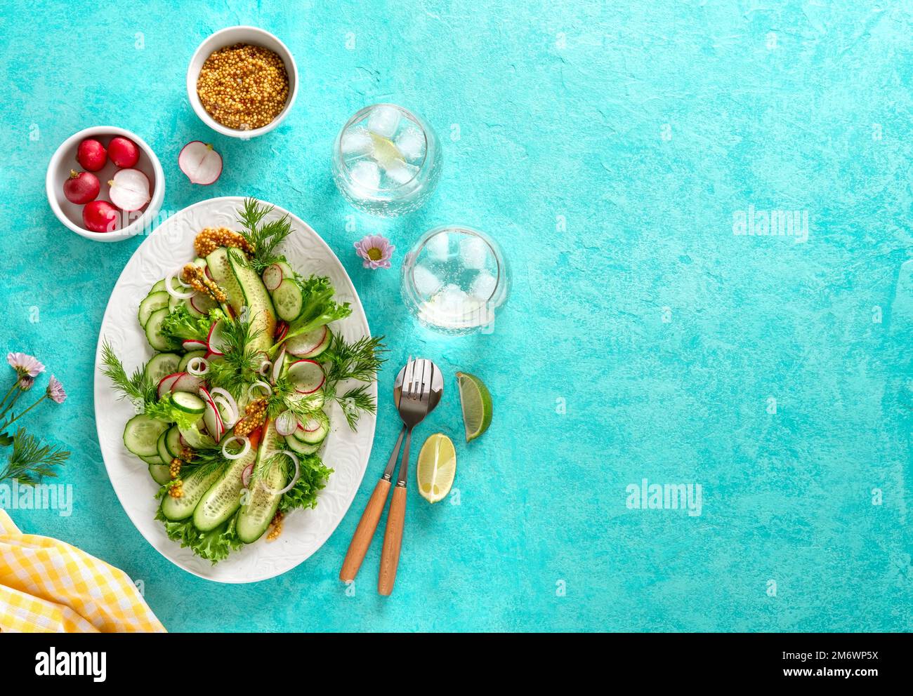 Fresh mixed vegetables salad with cucumber, radish and tomato. Summer ...