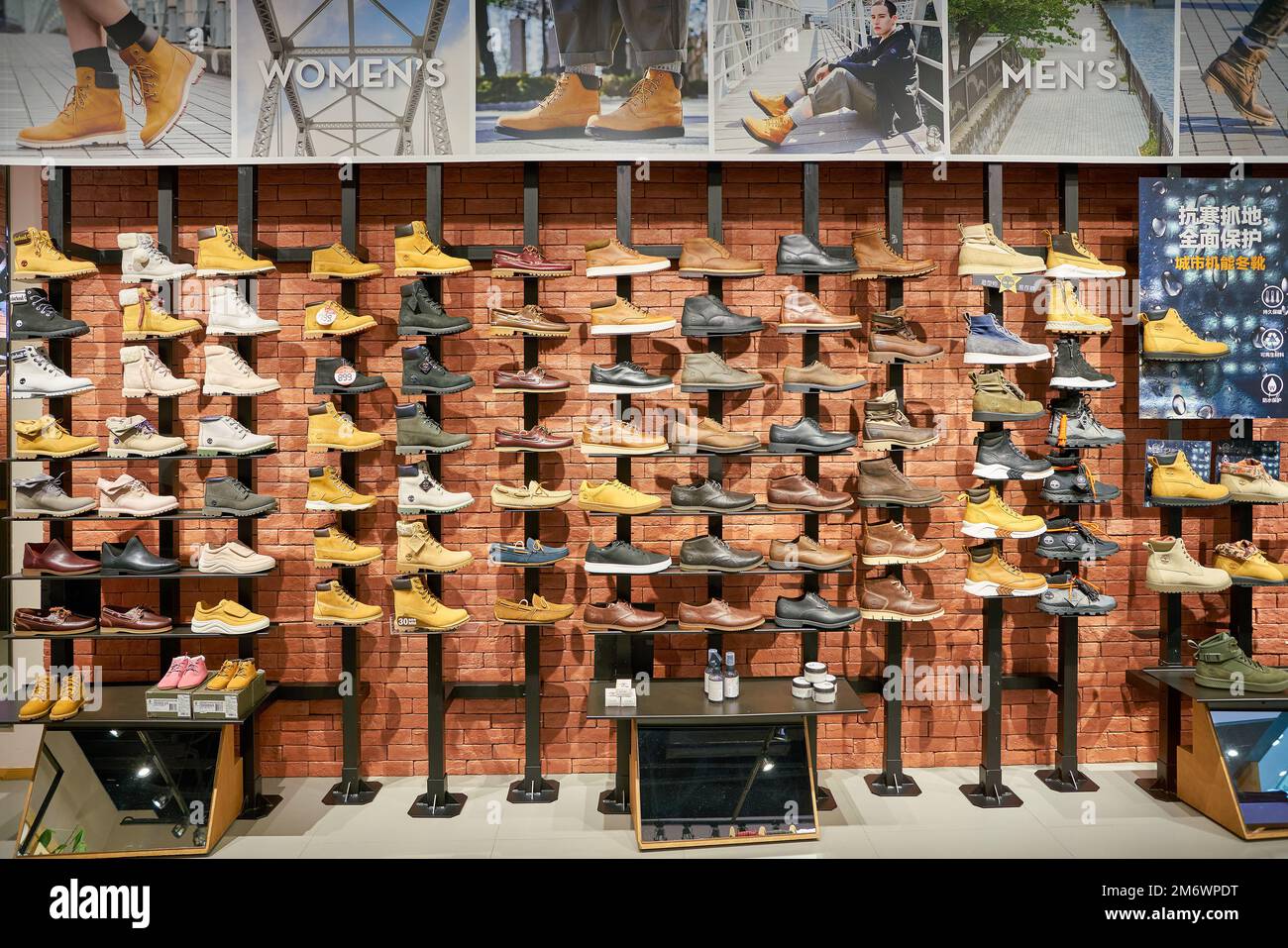 SHENZHEN, CHINA - CIRCA NOVEMBER, 2019: various outdoor footwear on ...