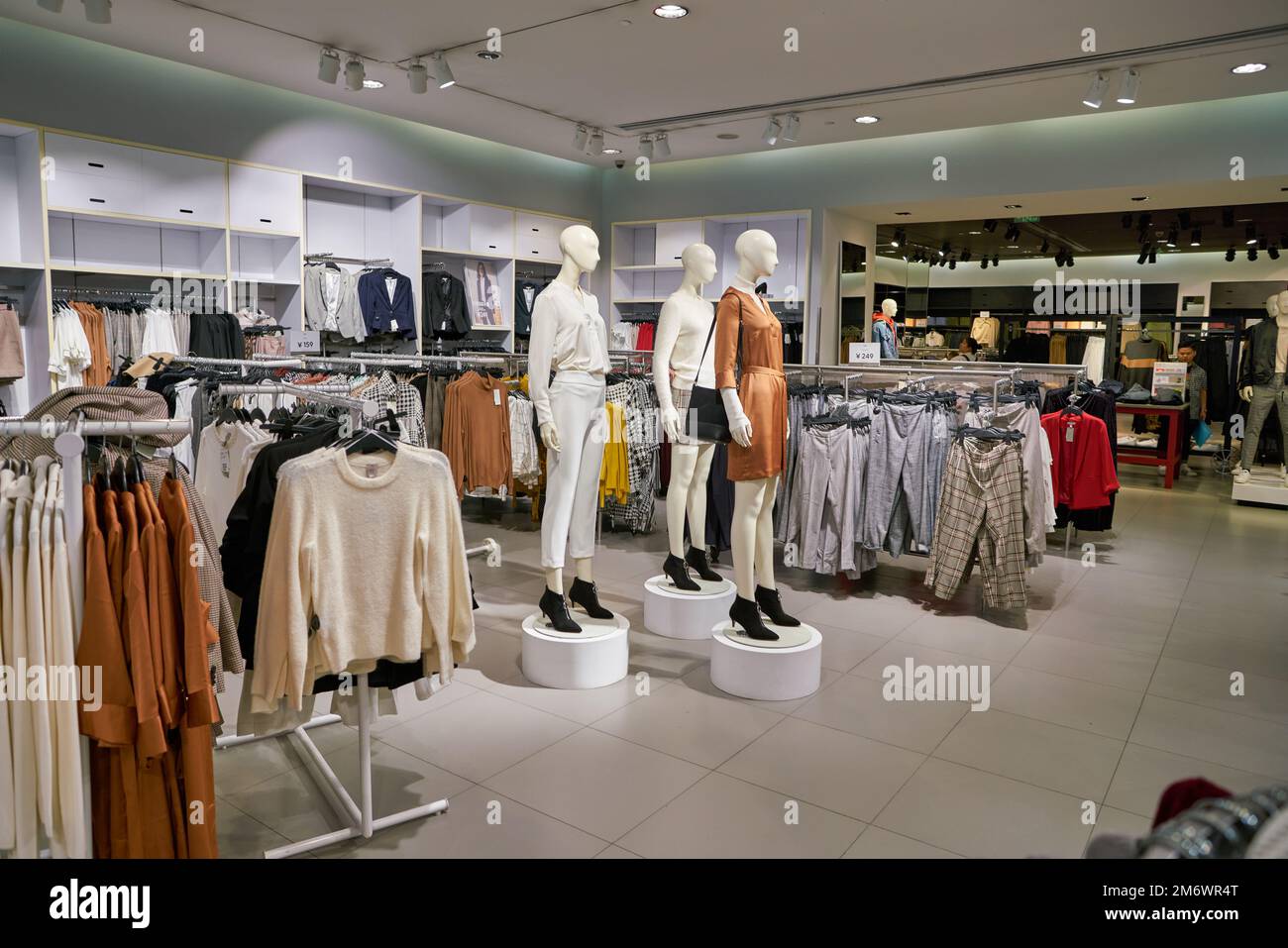 SHENZHEN, CHINA - CIRCA NOVEMBER, 2019: apparel on display at H and M ...