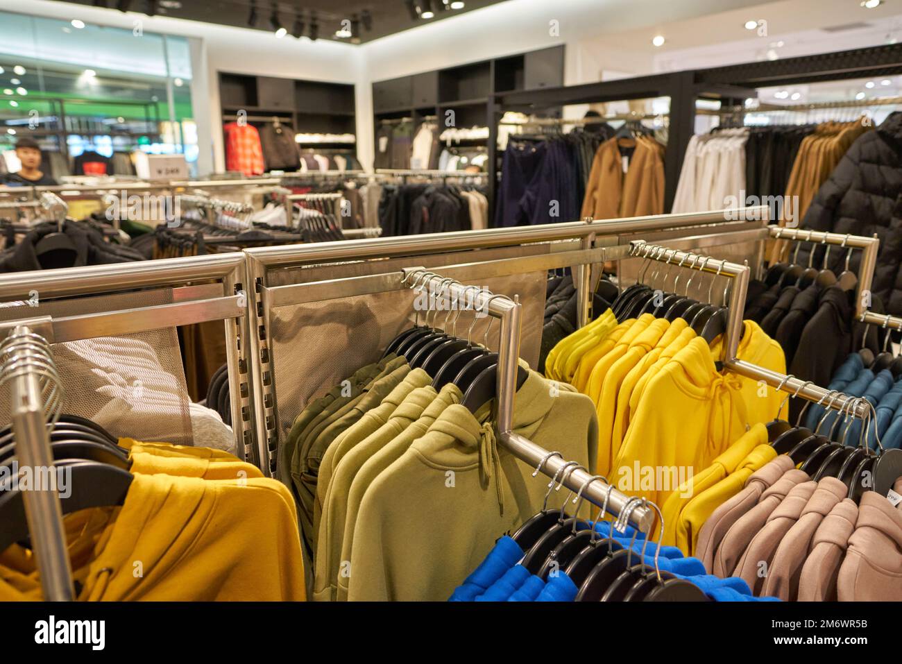 SHENZHEN, CHINA - CIRCA NOVEMBER, 2019: apparel on display at H and M ...